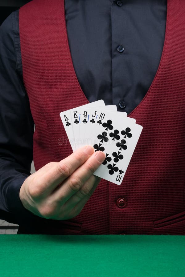 The Dealer`s Hand is Holding a Black Combination of Winning Cards Stock ...
