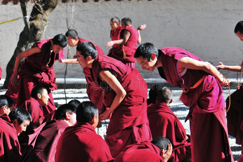 Debating monks in Tibet editorial stock image. Image of prayer - 55821334