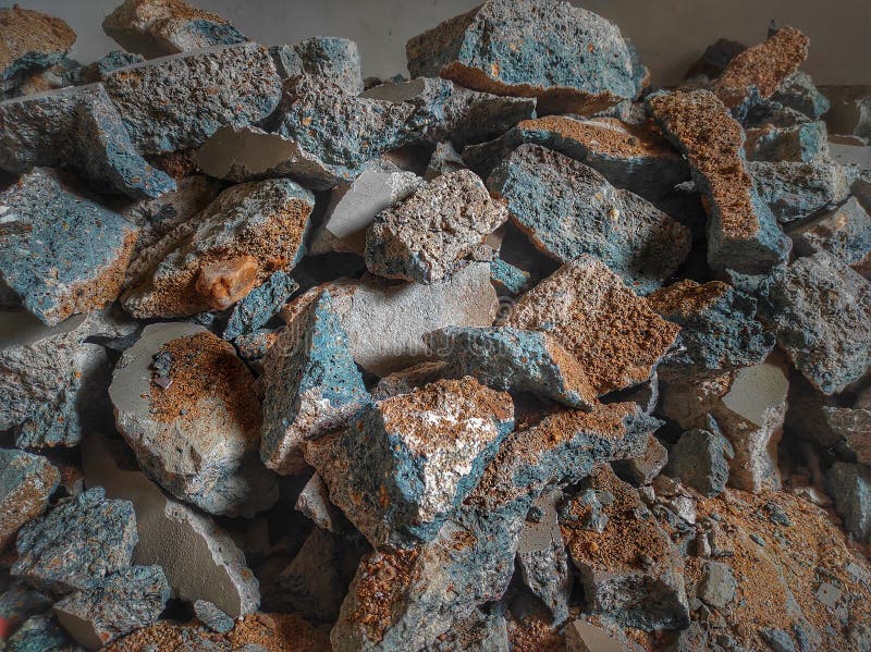 Debris of Building Blue and Brown Colored Cemented Stones on the Ground ...