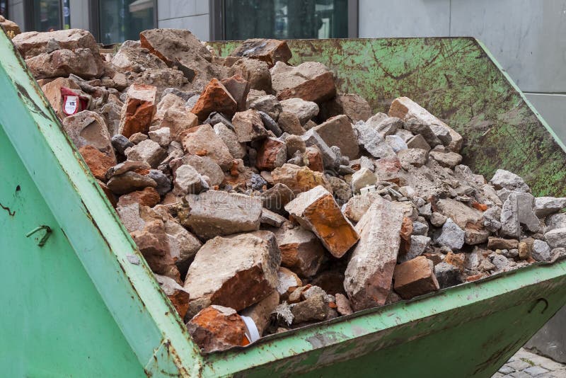 Debris in a Green Metal Container. Stock Image - Image of bricks ...