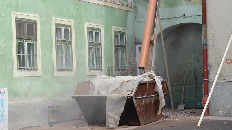 Debris Gutter to Dumpster stock video. Video of estate - 47822735