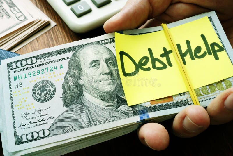 Debt Help Concept. Hand Holding Stack of Money Stock Photo - Image of ...