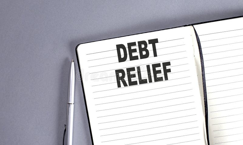 DEBT RELIEF Word on the Notebook with Pen Stock Image - Image of wealth ...