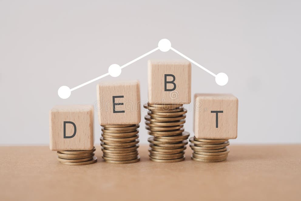DEBT Word on Wooden Cube Blocks Word on Stack of Coin and Graph Above ...
