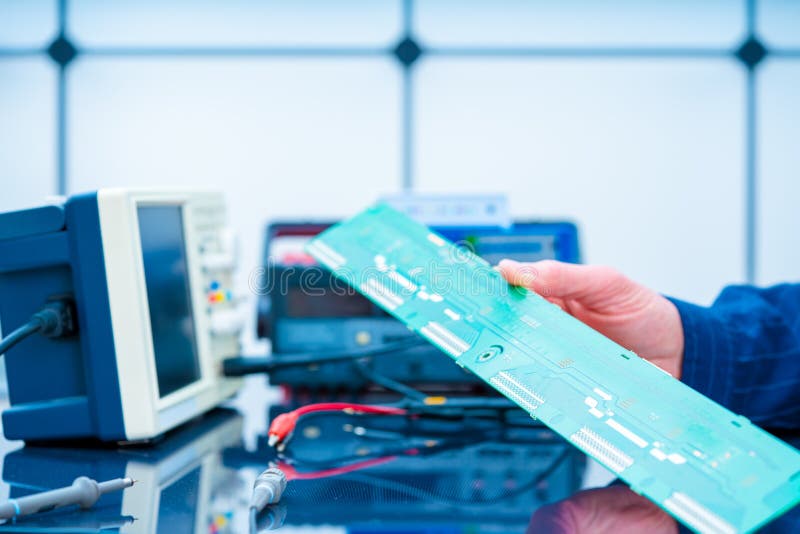 Debugging Electronics Device Pcb Witch Microcontroller In Electronics Laboratory Stock Image