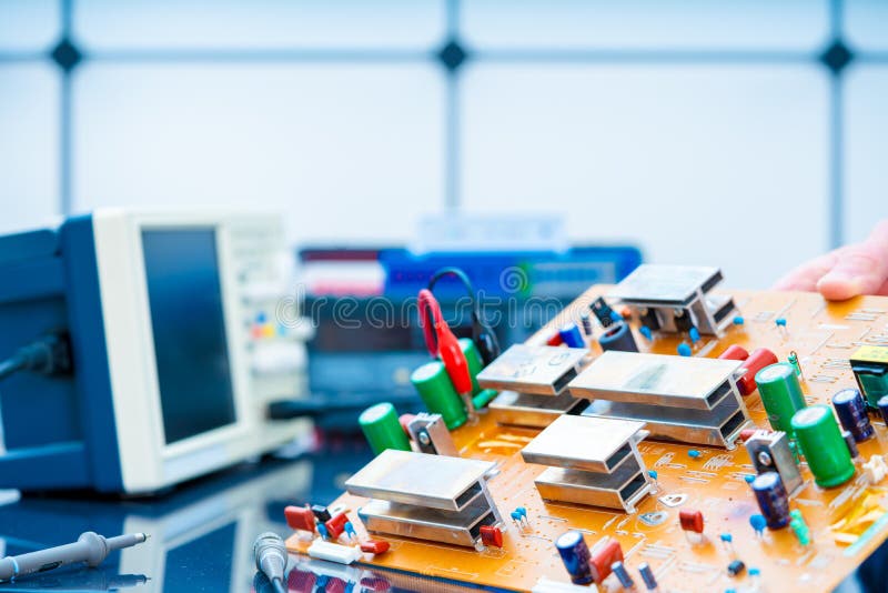 Debugging Electronics Device. PCB Witch Microcontroller in Electronics Laboratory Stock Photo ...