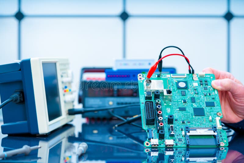 Debugging Electronics Device. PCB Witch Microcontroller in Electronics ...