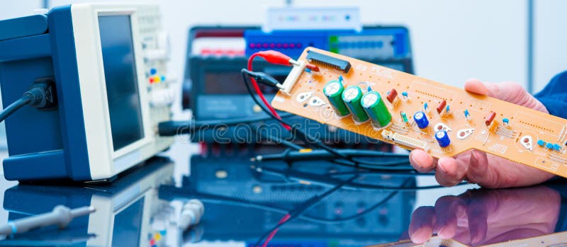 Debugging Electronics Device. PCB Witch Microcontroller in Electronics ...