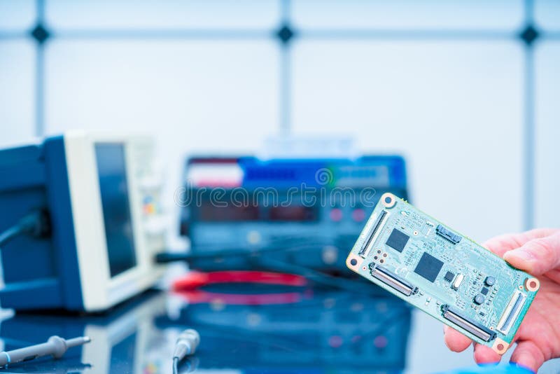 Debugging Electronics Device. PCB Witch Microcontroller in Electronics ...