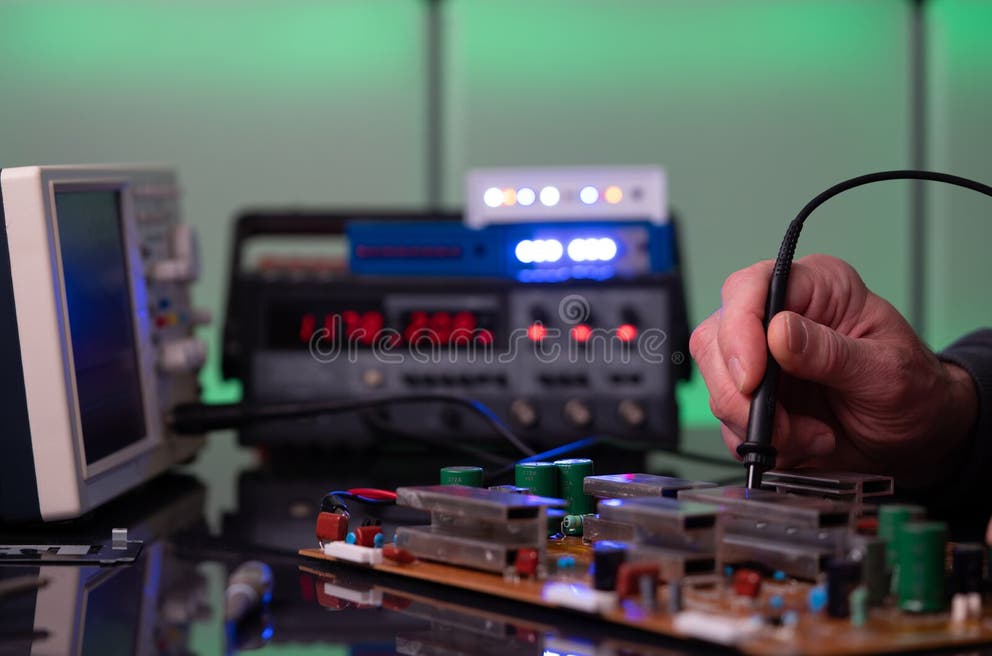 Debugging Electronics Device. PCB Witch Microcontroller in Electronics ...