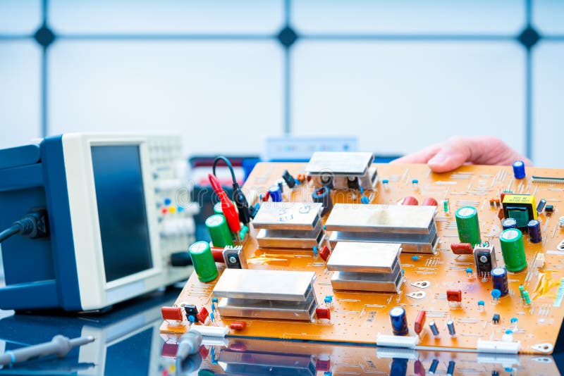 Debugging Electronics Device. PCB Witch Microcontroller in Electronics ...