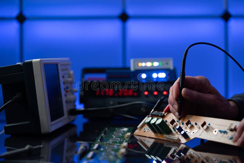 Debugging Electronics Device. PCB Witch Microcontroller in Electronics ...