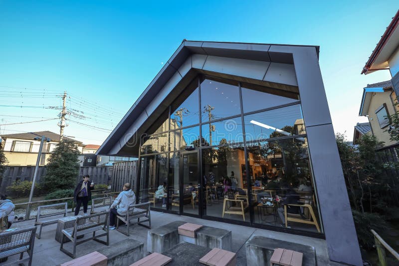 Dec 9 2024 Cafe with Outdoor Seating Featuring Glass Facad Editorial ...