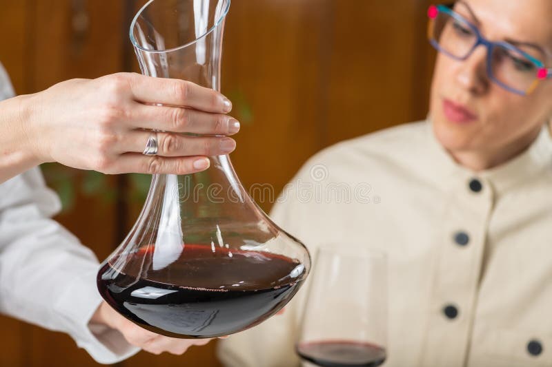 Decanting wine stock photo. Image of explains, technique - 277029110