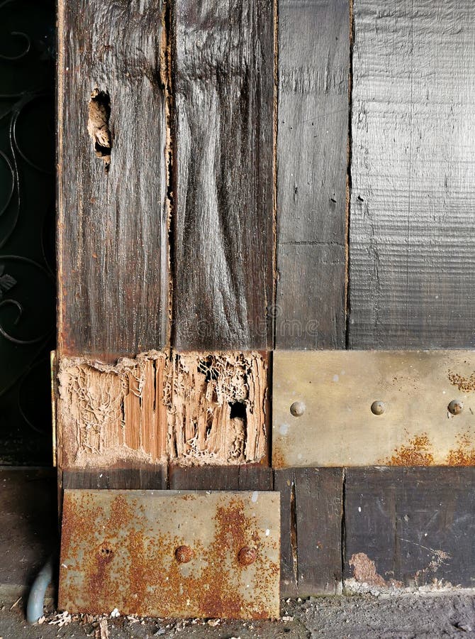 Weathered Brown Wooden Column Structure Was Repaired with Rusted Sheet ...