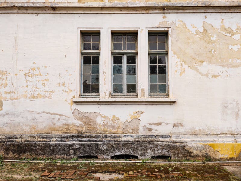 Decaying Glazed Windows of an Abandoned Building. Stock Photo - Image ...
