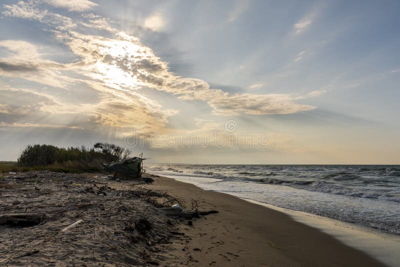 Decaying Seascape with Litter Abandoned on the Beach Stock Image ...