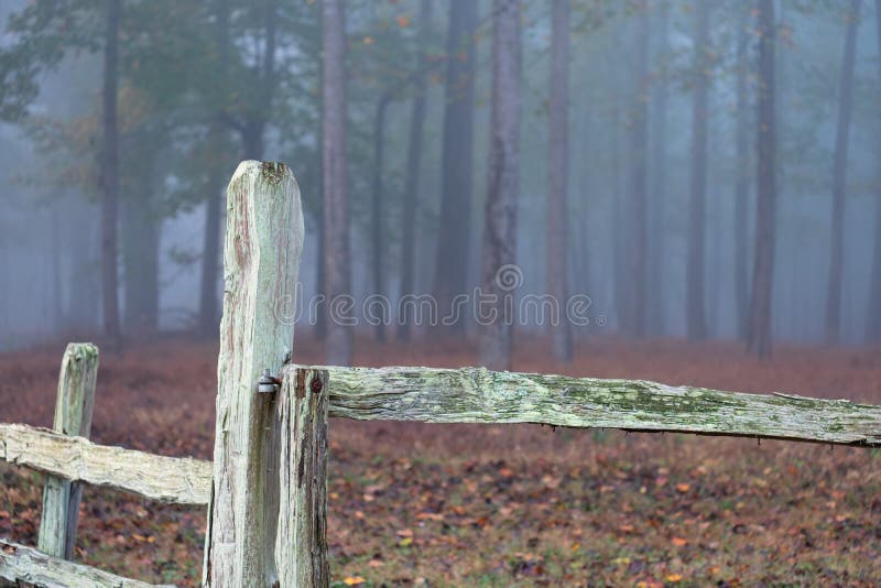 Decaying Wooden Fence and Gate with Fog and Trees in Fall Stock Image ...