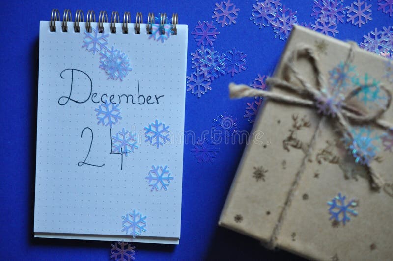 December 24 in Calendar Next To Christmas Present Stock Image - Image ...