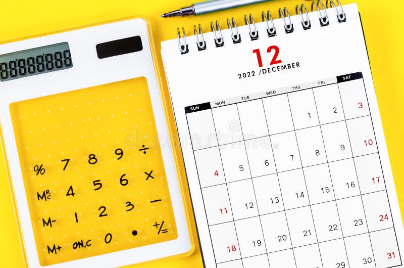 The December 2022 Desk Calendar with Calculator Stock Photo - Image of ...