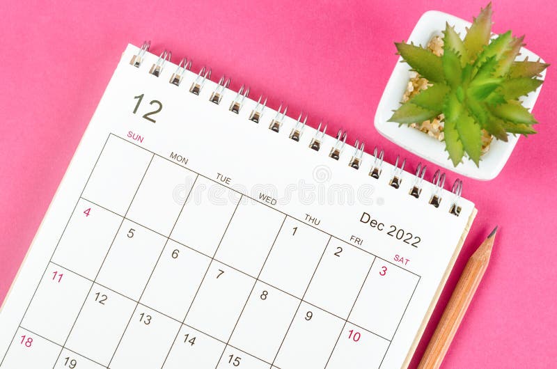 December 2022 Desk Calendar with Pencil on Pink Background Stock Photo ...