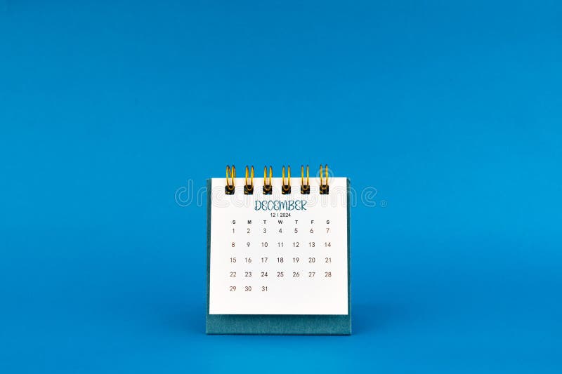December 2024 Mini Desk Calendar on Blue Background Stock Image - Image ...
