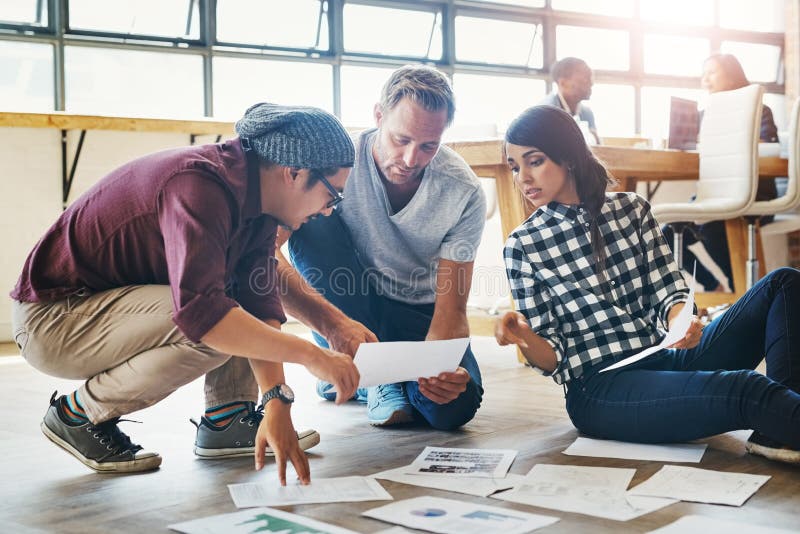 Deciding Which Designs Will Work the Best. a Group of Businesspeople ...