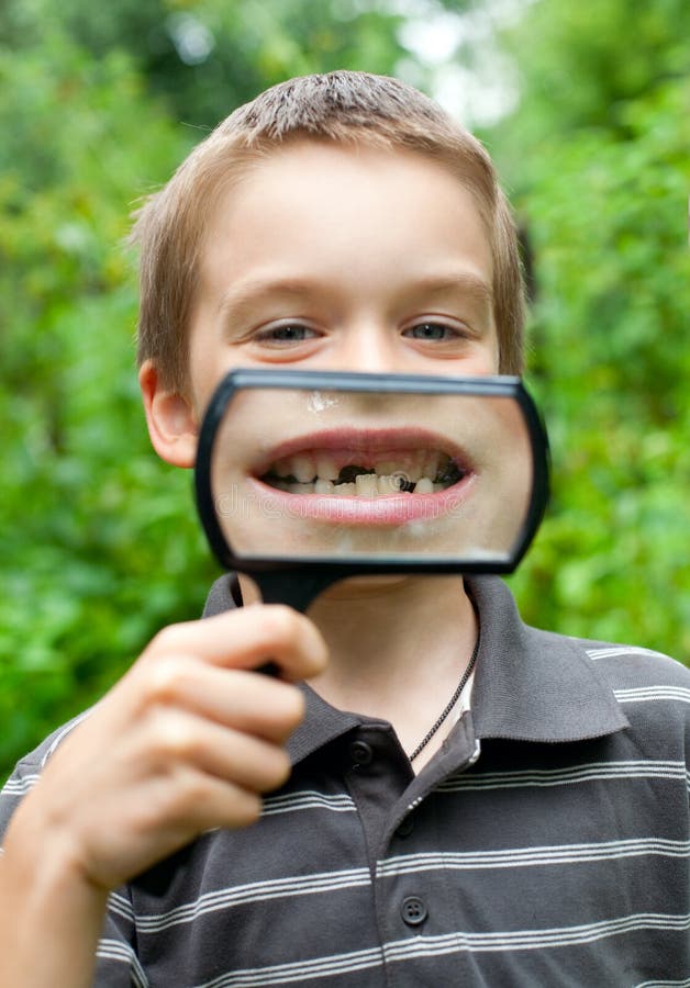 Deciduous teeth stock photo. Image of lens, hand, gone - 10426230