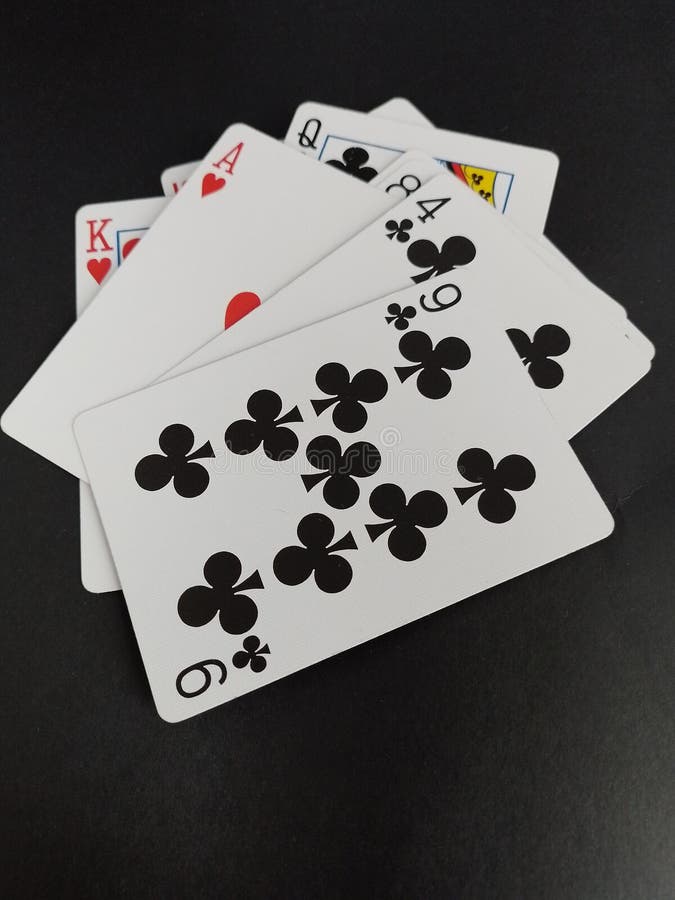 A Deck of Cards Fanned Out on a Black Background Stock Photo - Image of ...