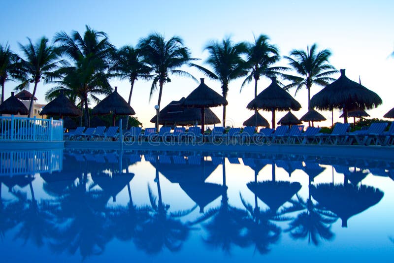 Deck Chairs from the Pool Evening Stock Image - Image of palms, chairs ...