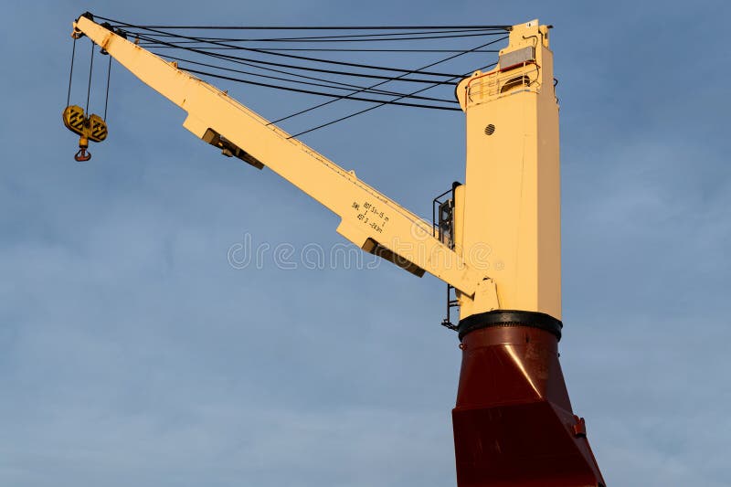 Deck crane on board a ship stock photo. Image of shipping - 302739898