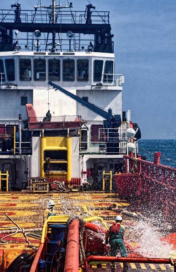 Deck crew working on deck editorial stock image. Image of crane - 85373844