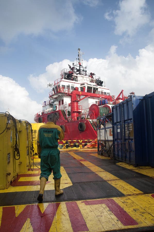 Deck crew working on deck editorial stock photo. Image of cargo - 85374943
