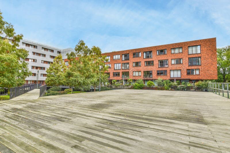 The Deck of a Dock in Front of a Building Editorial Photo - Image of ...