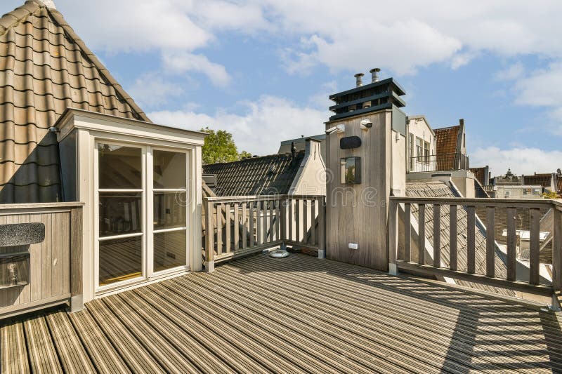 The Deck Has a View of the Rooftops and Stock Image - Image of building ...