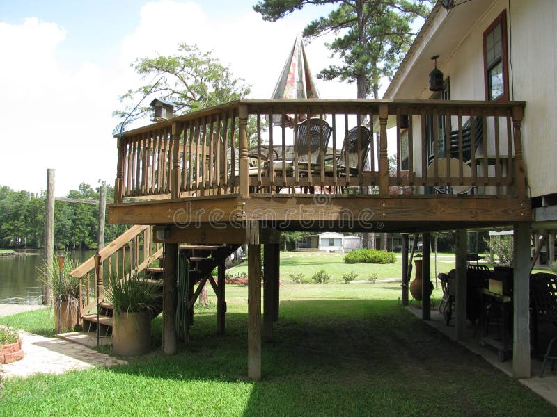 Deck on House Overlooking the Water Stock Image - Image of river, water ...