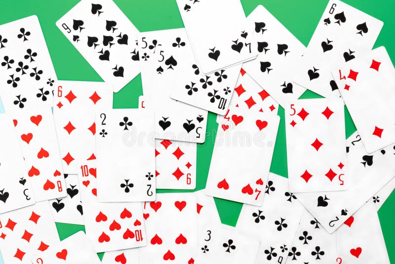 Deck of Playing Cards on Green Background Stock Photo - Image of ...