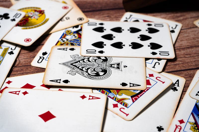 Deck of Poker Cards Scattered on a Wooden Table. Selective Focus Stock ...