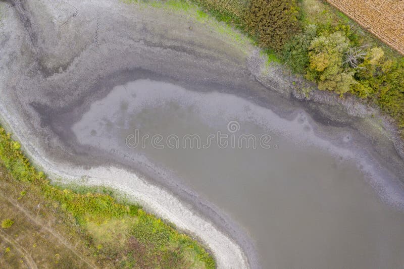 Declining Water Levels in Freshwater Due To Global Warming. Stock Photo ...