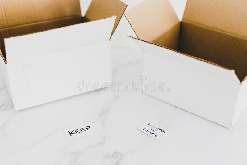 Decluttering Concept, Storage Boxes To Sort between Objects To Keep and ...