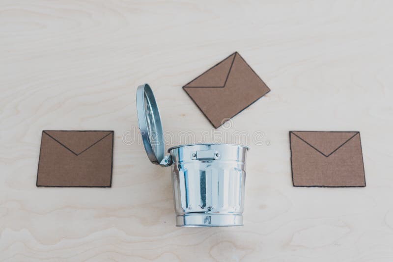 Decluttering Your Inbox, Email Envelopes and Garbage Bin on Desk Stock ...