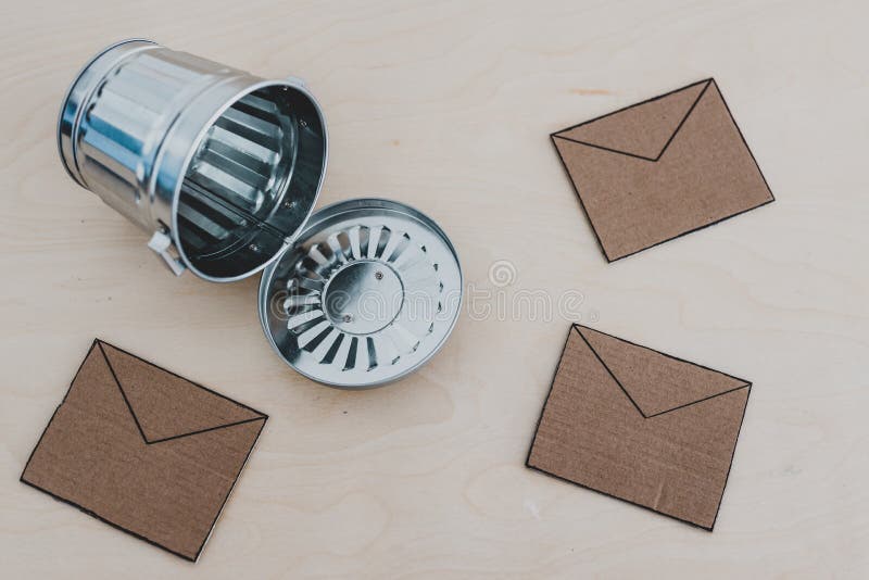 Decluttering Your Inbox, Email Envelopes and Garbage Bin on Desk Stock ...