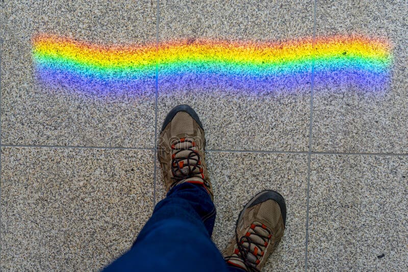 Decomposed Light Stroke Making Rainbow Effect Projected on Tile Floor ...