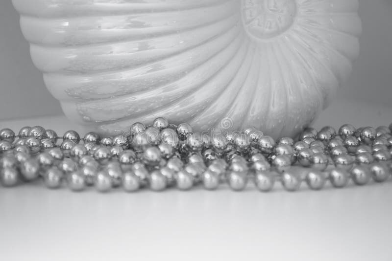 Decor Element, Beads on a Vase Background in the Form of a Shell ...