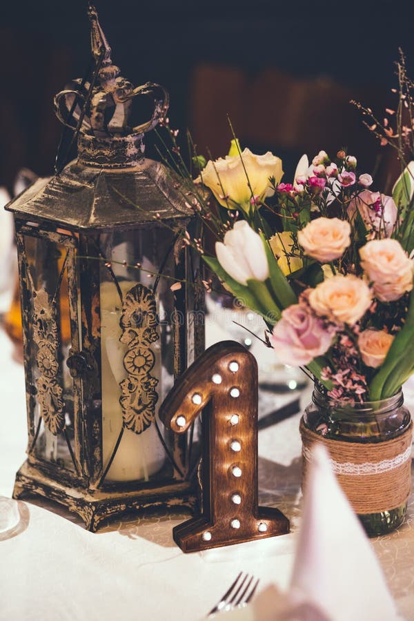 Decor on the Table with Old Night Lamp, Flowers and Number One Stock ...