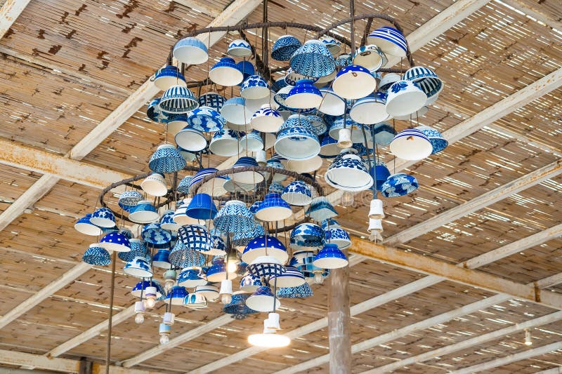 Decorate Blune and Vintage Ceramic Plates and Bowls Hanging on the ...