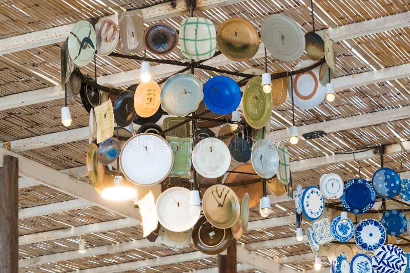 Decorate Blune and Vintage Ceramic Plates and Bowls Hanging on the ...
