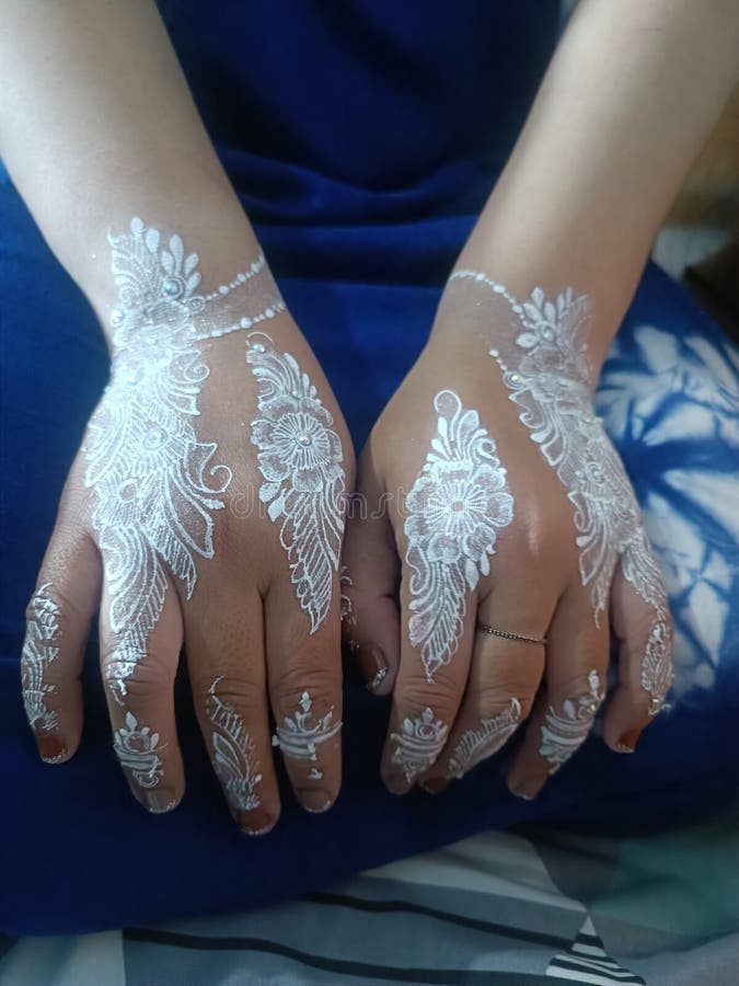 Decorate hands using henna stock photo. Image of henna - 274956714
