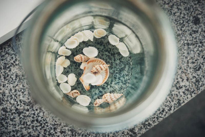 Decorated Bottle with Shells in Water Stock Photo - Image of shell ...