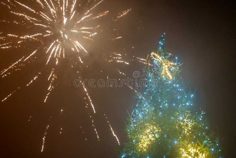 Decorated Christmas Tree and Fireworks Stock Photo - Image of pine ...